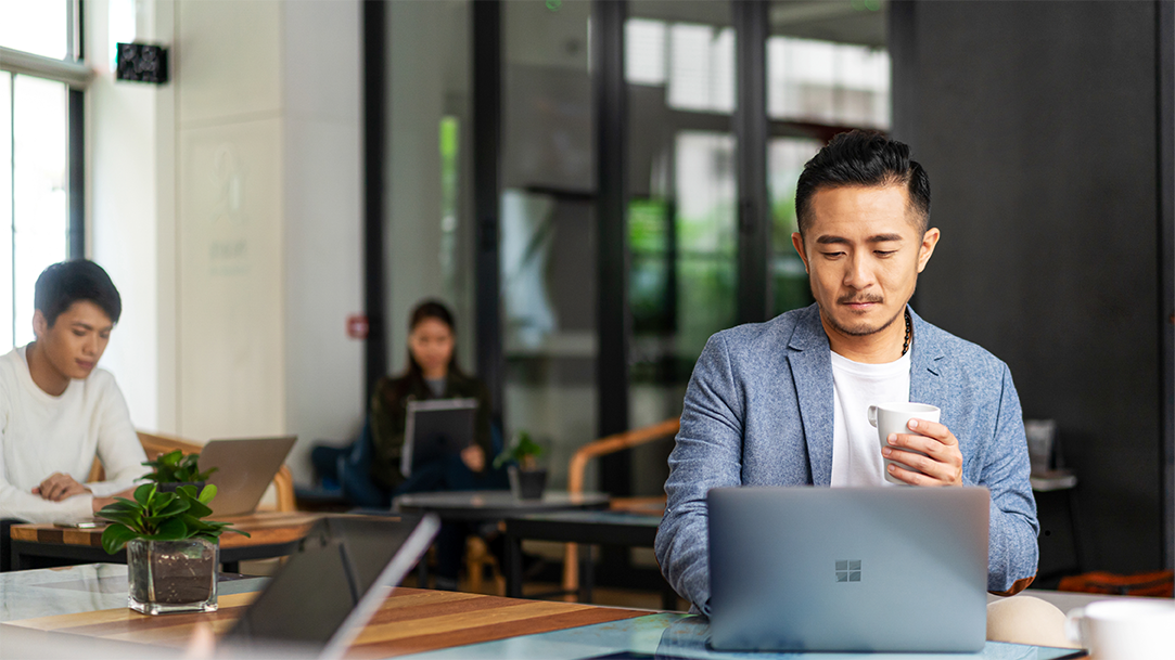 A young professional implementing HTTPS security on his computer